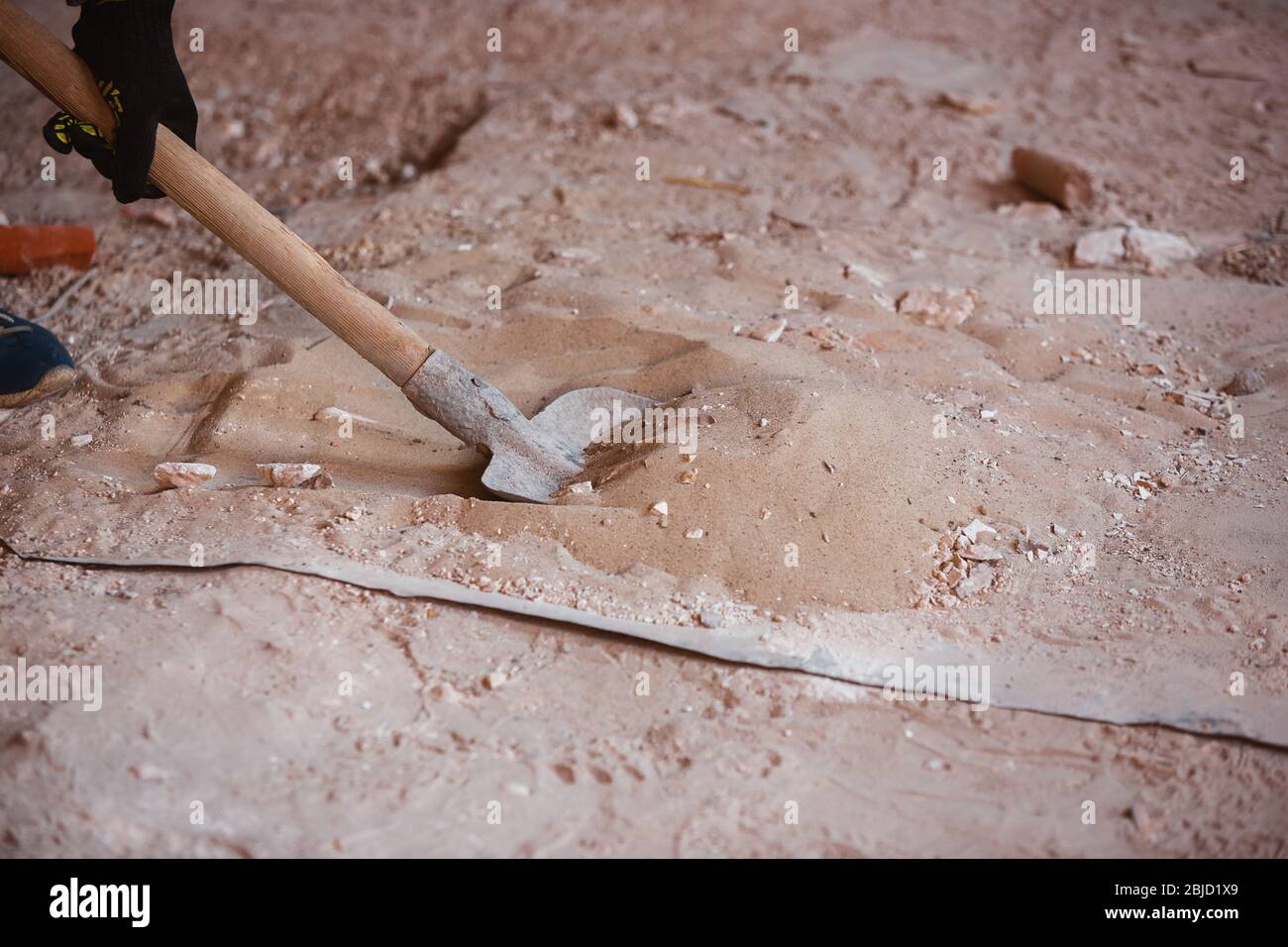 Closeup of repairman in uniform, professional builder working using ...