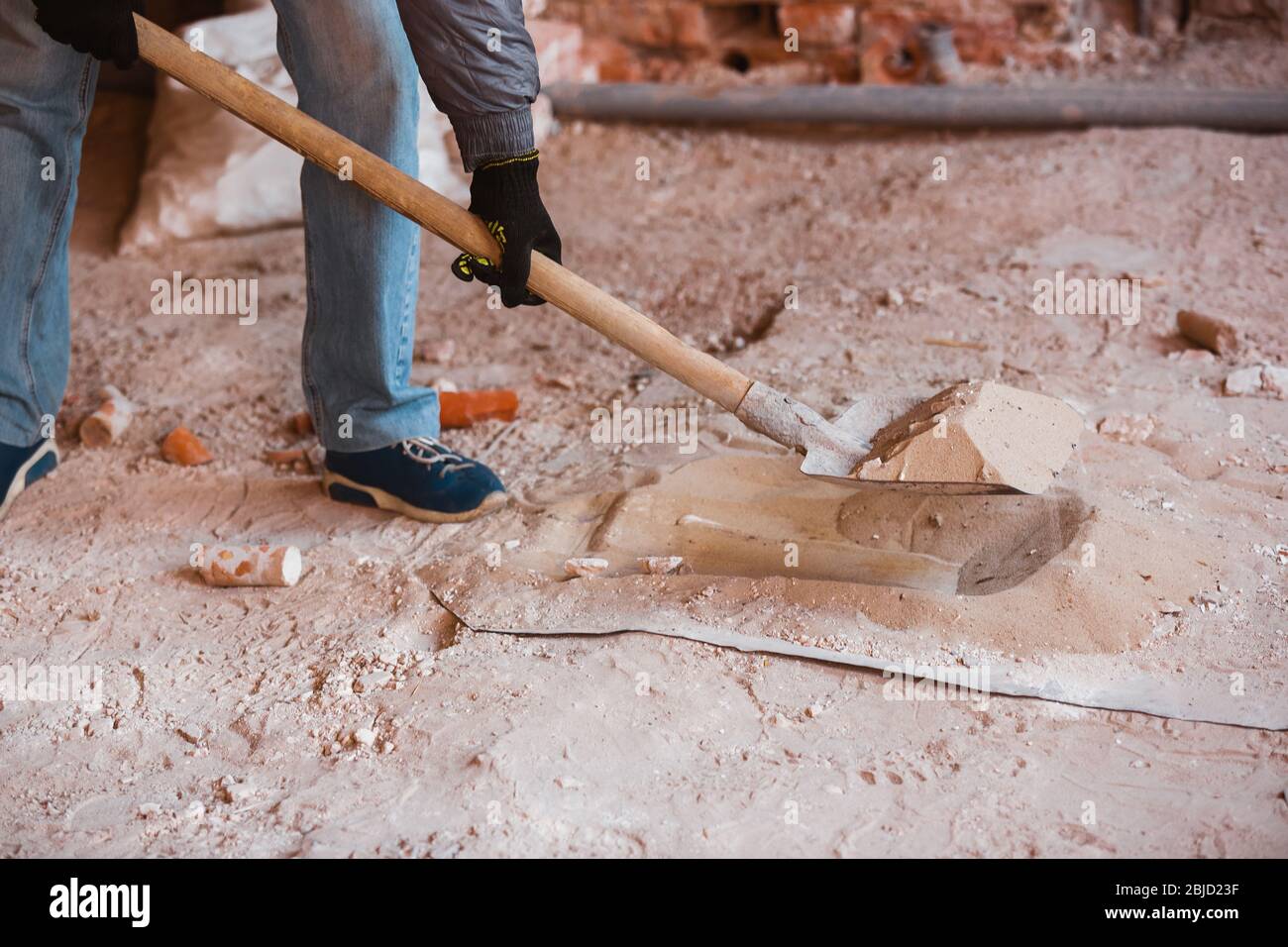 Closeup of repairman in uniform, professional builder working using ...