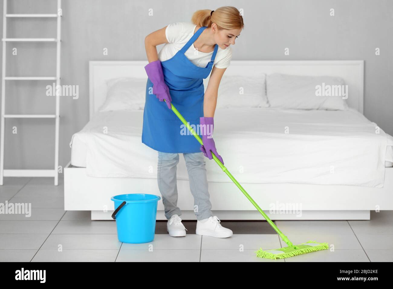 Moping the floor hi-res stock photography and images - Alamy