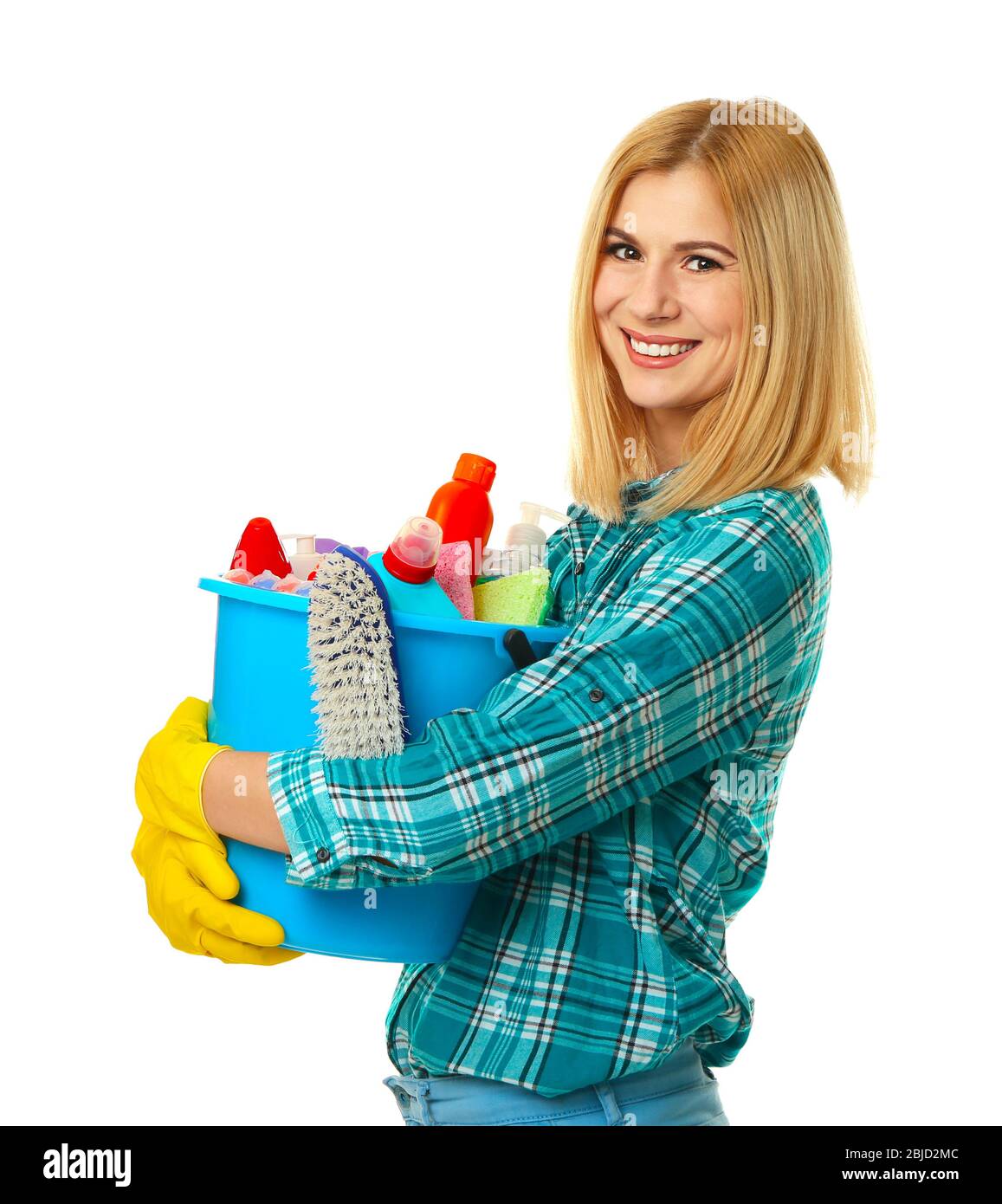 Pretty adult woman with cleaning supplies on white background Stock ...