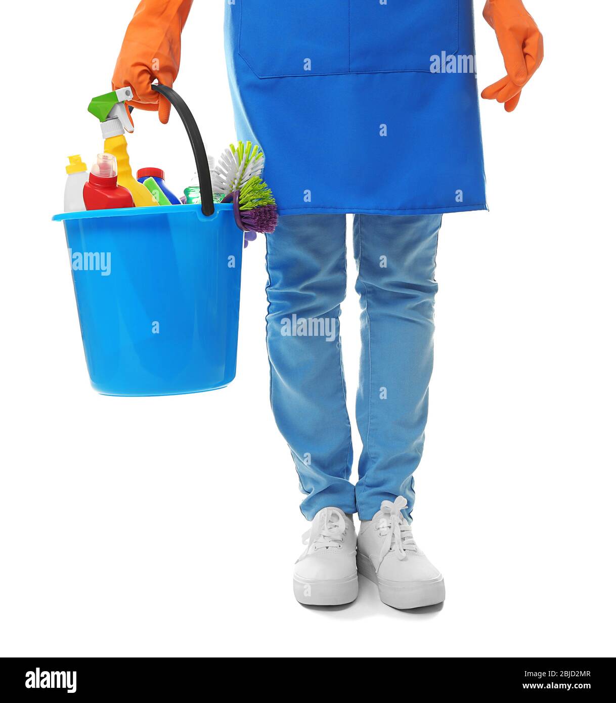 Woman with bucket full of cleaning supplies on white background Stock ...