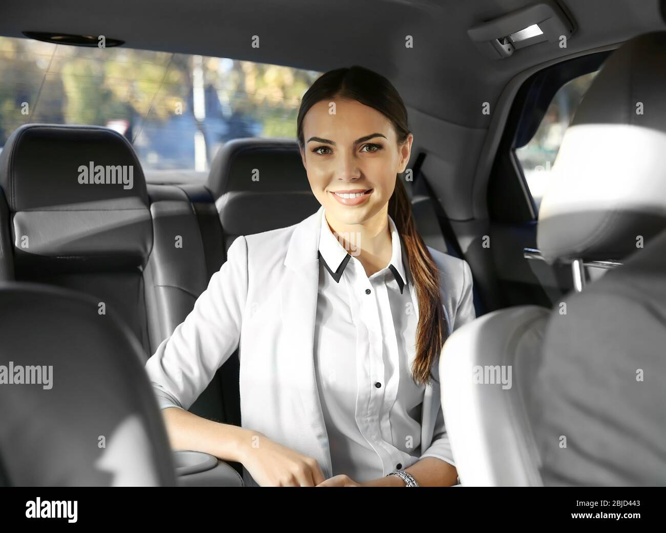 The rich woman with chauffeur hi-res stock photography and images - Alamy