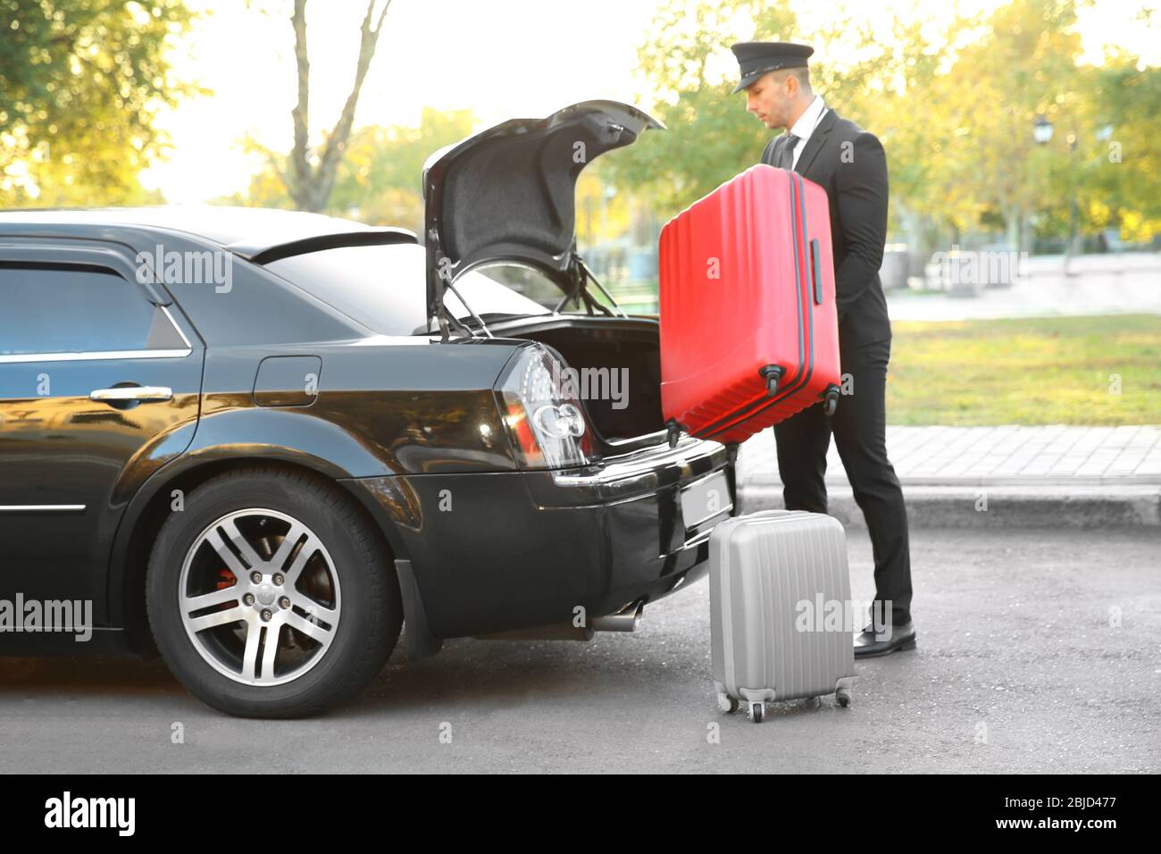 Limo driver suitcase hi-res stock photography and images - Alamy