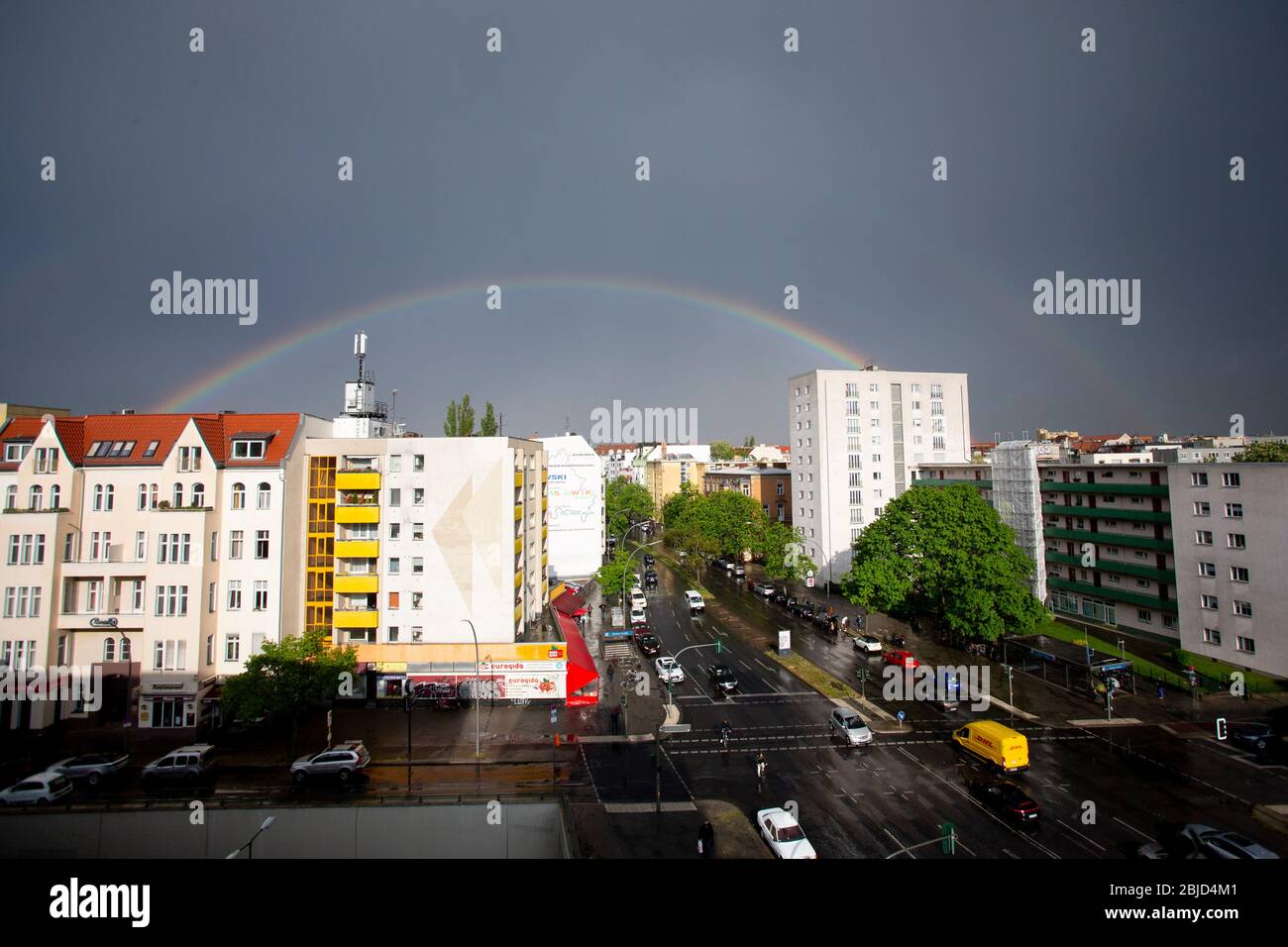29 April 2020, Berlin: A rainbow can be seen over the crossing of ...