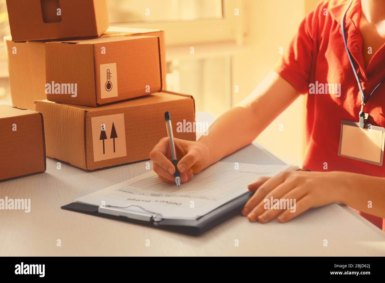 Logistics writing hands clipboard hi-res stock photography and images ...