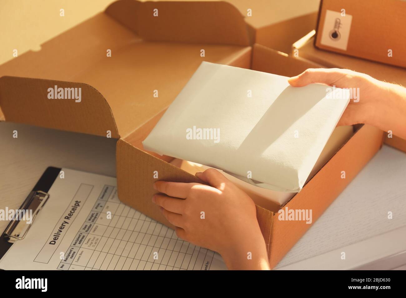 Courier hands hi-res stock photography and images - Alamy