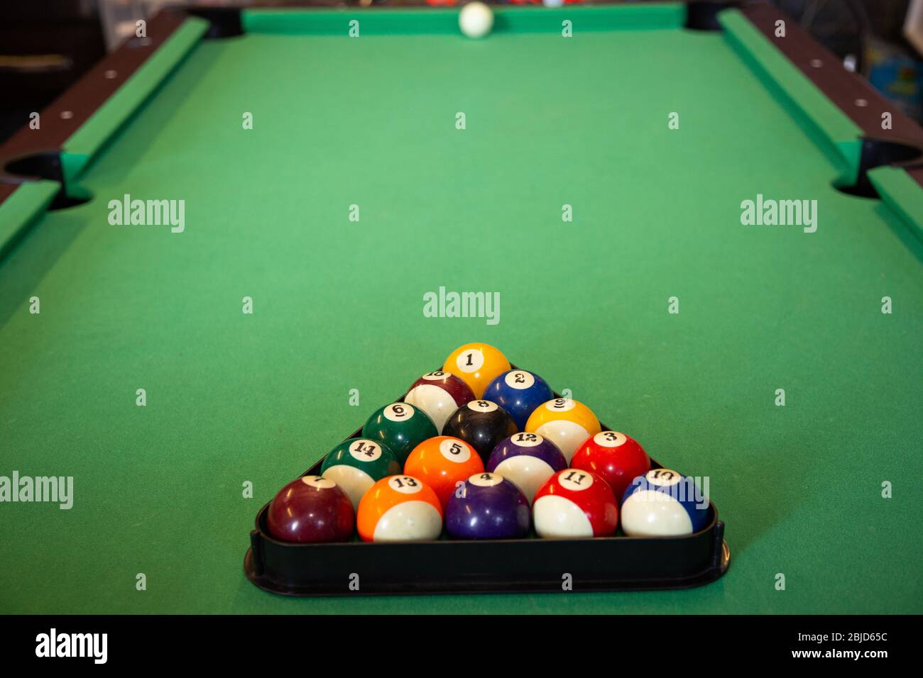 Pool balls in triangle Stock Photo - Alamy