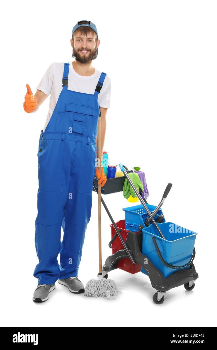 Funny young man with cleaning supplies on white background Stock Photo ...