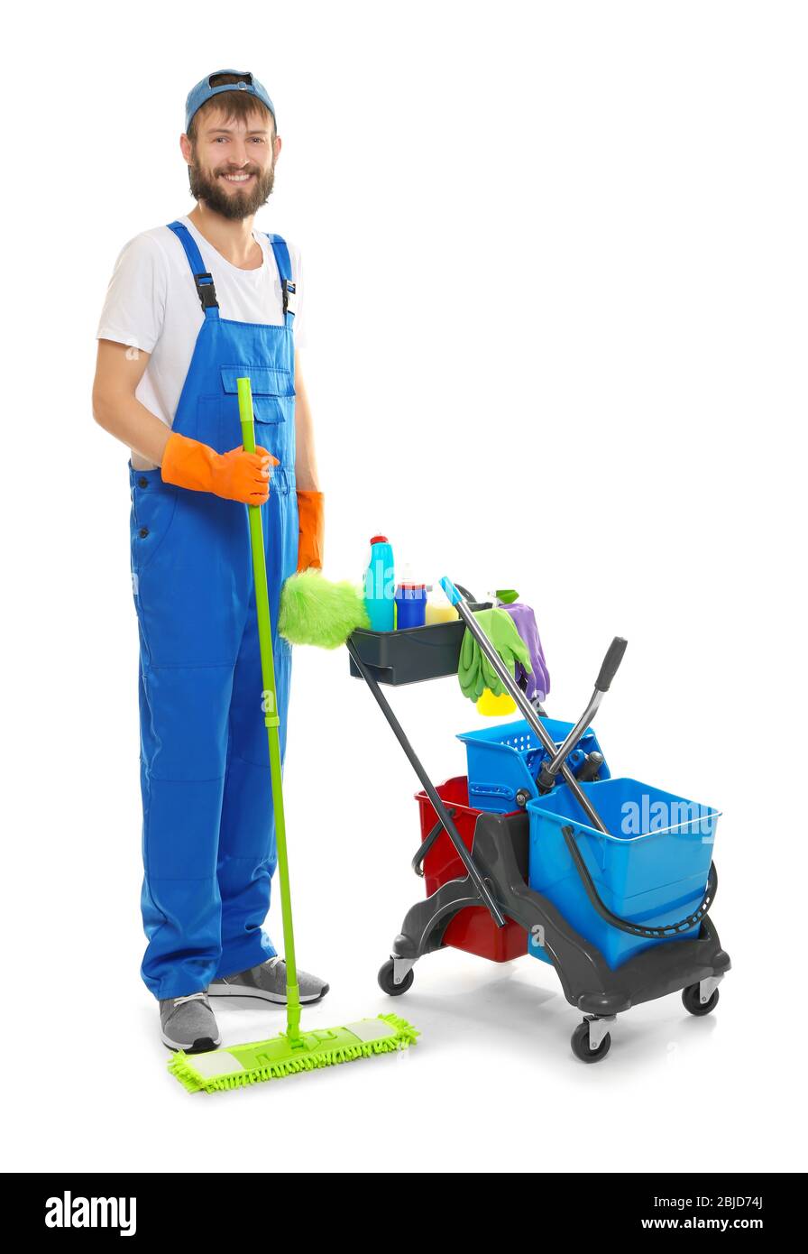 Funny young man with cleaning supplies on white background Stock Photo ...