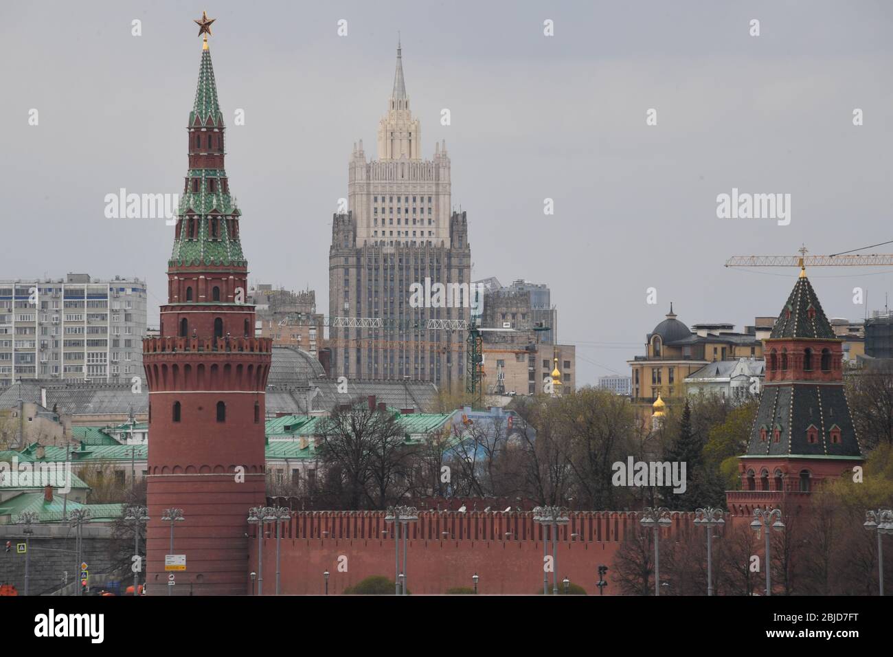 Moscow. Tower of the Moscow Kremlin against the background of high-rise ...