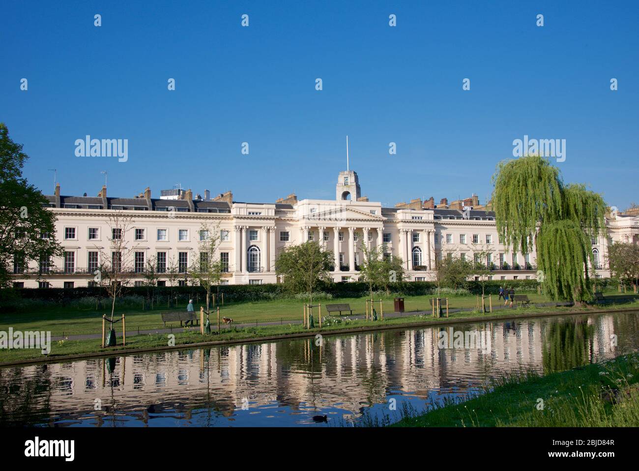 Cornwall Terrace reflected in canal Regents Park London England Stock ...