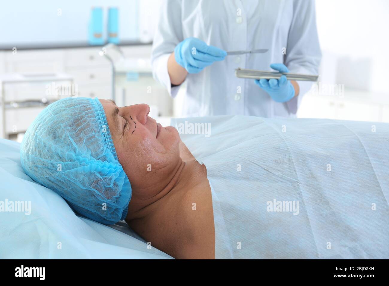 Hands lifting hat hi-res stock photography and images - Alamy