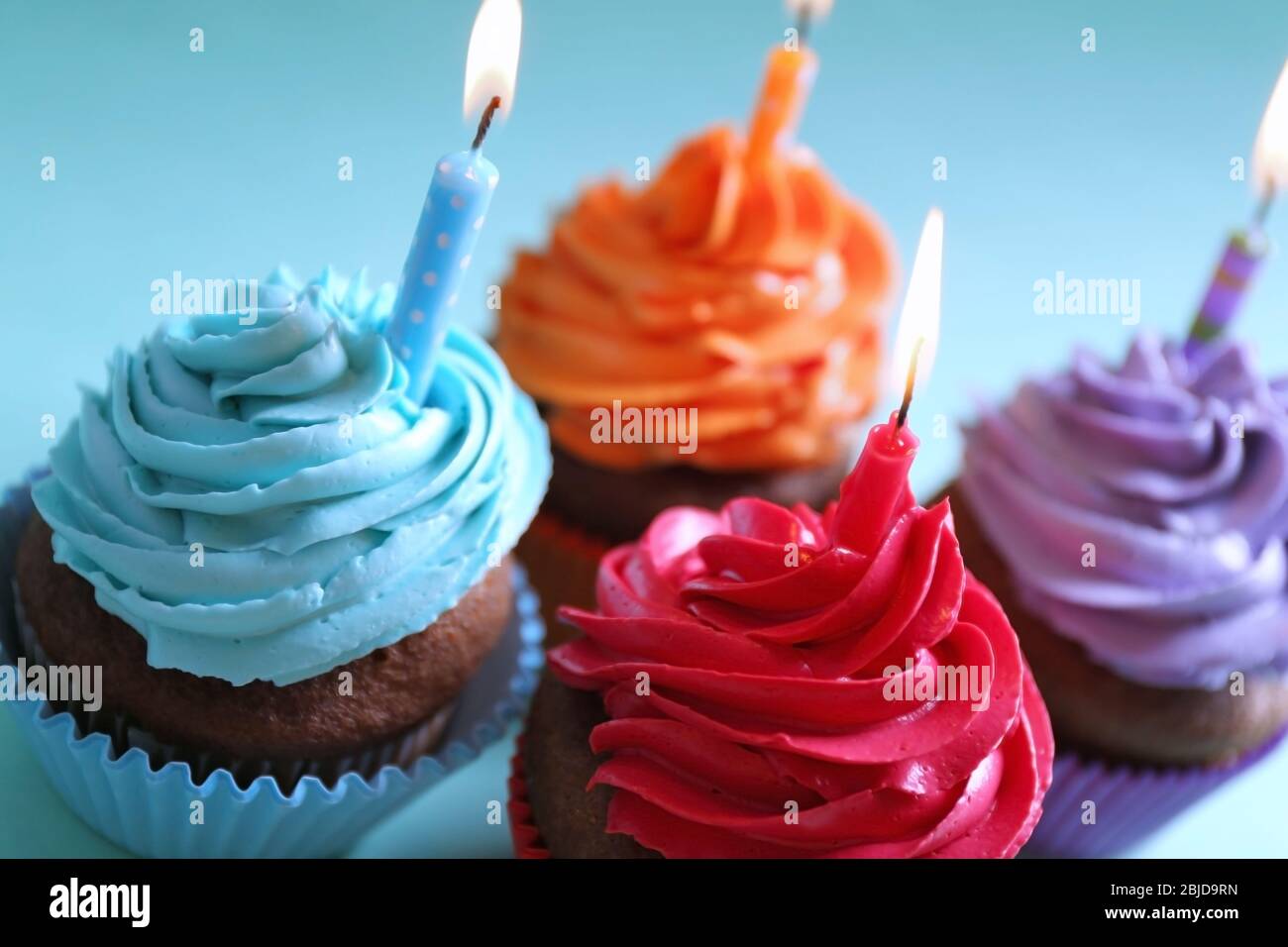 Birthday cupcakes with candles hi-res stock photography and images - Alamy