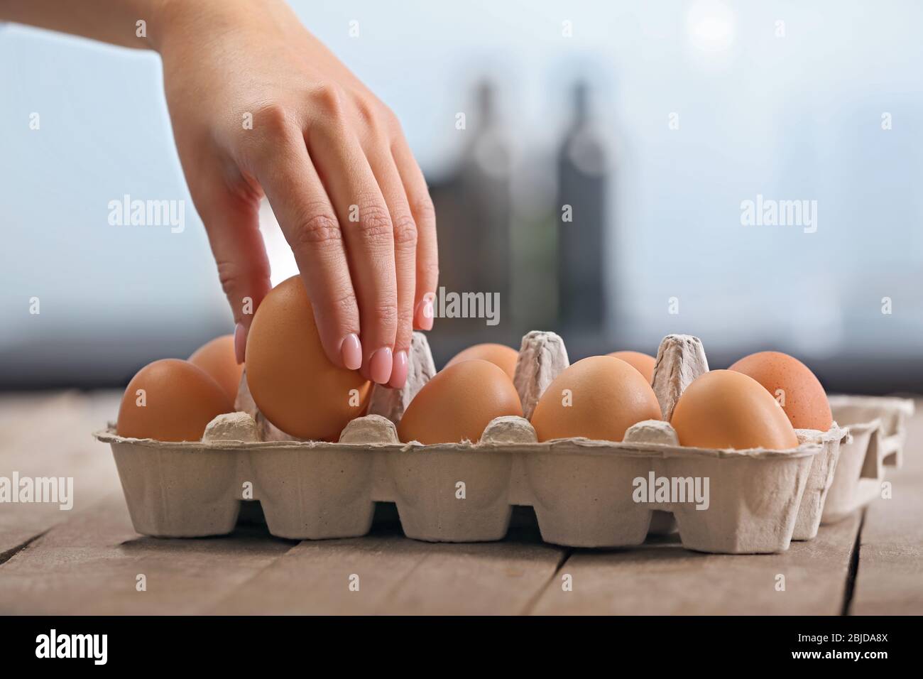 Female with egg package hi-res stock photography and images - Alamy
