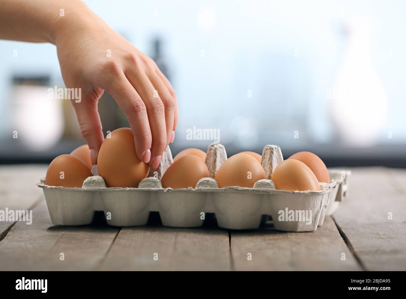 Female with egg package hi-res stock photography and images - Alamy