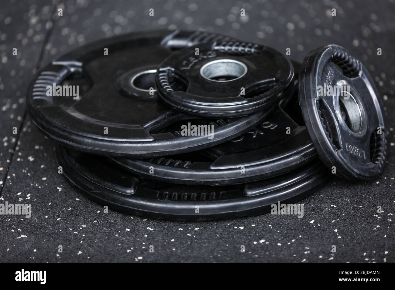 Weight plates on floor hi-res stock photography and images - Alamy