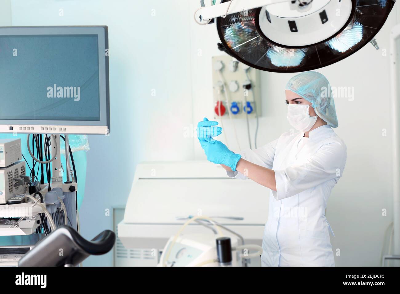 Young doctor in operating room of modern clinic Stock Photo - Alamy
