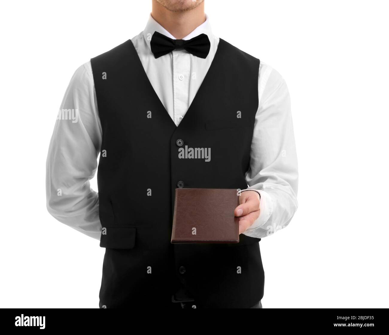 Cute waiter holding brown bill folder on white background Stock Photo ...
