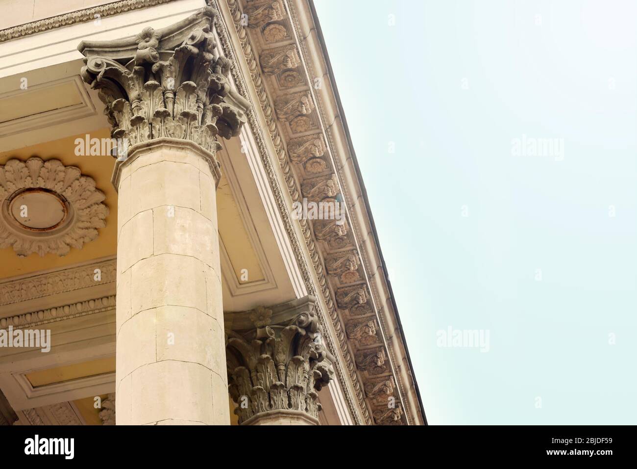 Closeup of building with columns in neoclassical style Stock Photo - Alamy
