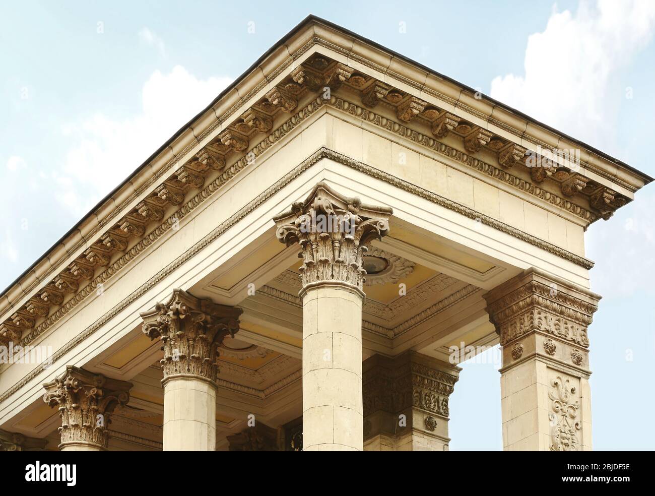 Closeup of building with columns in neoclassical style Stock Photo - Alamy