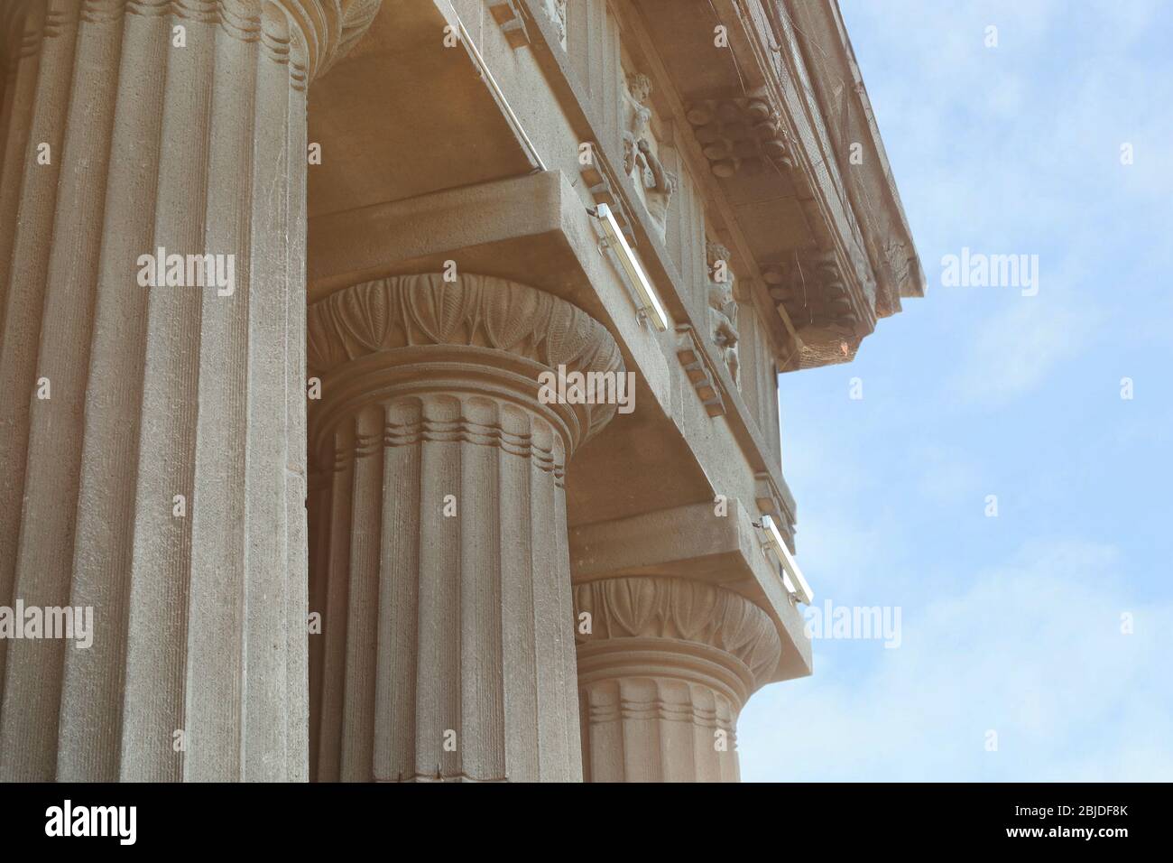 Closeup of building with columns in neoclassical style Stock Photo - Alamy