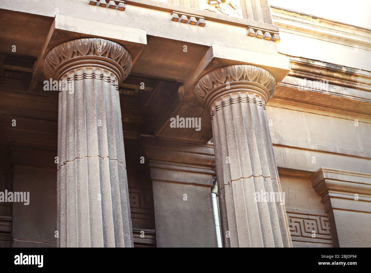 Closeup of building with columns in neoclassical style Stock Photo - Alamy