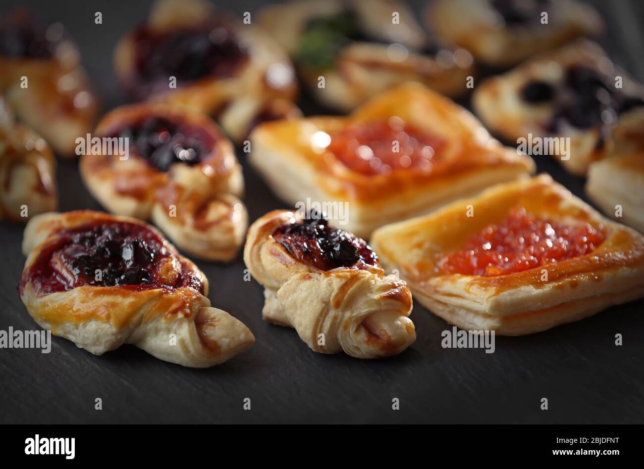 Sweet tasty pastries, closeup Stock Photo - Alamy