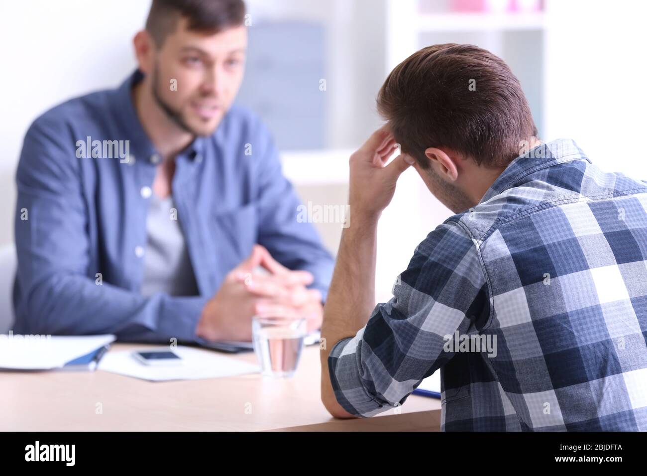 Male job applicant having interview Stock Photo - Alamy