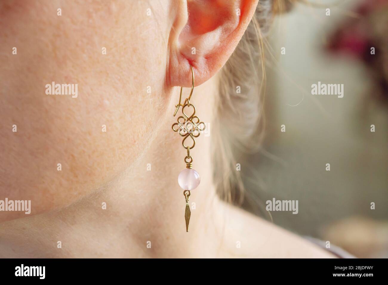 Female ear wearing tiny hi-res stock photography and images - Alamy