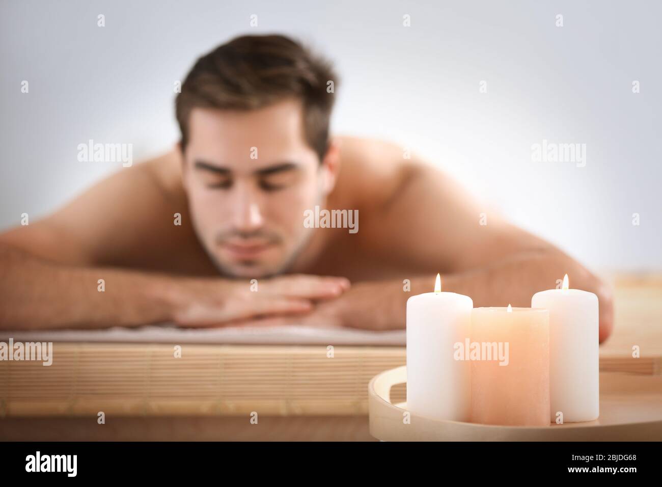 Man massage candles hi-res stock photography and images - Alamy