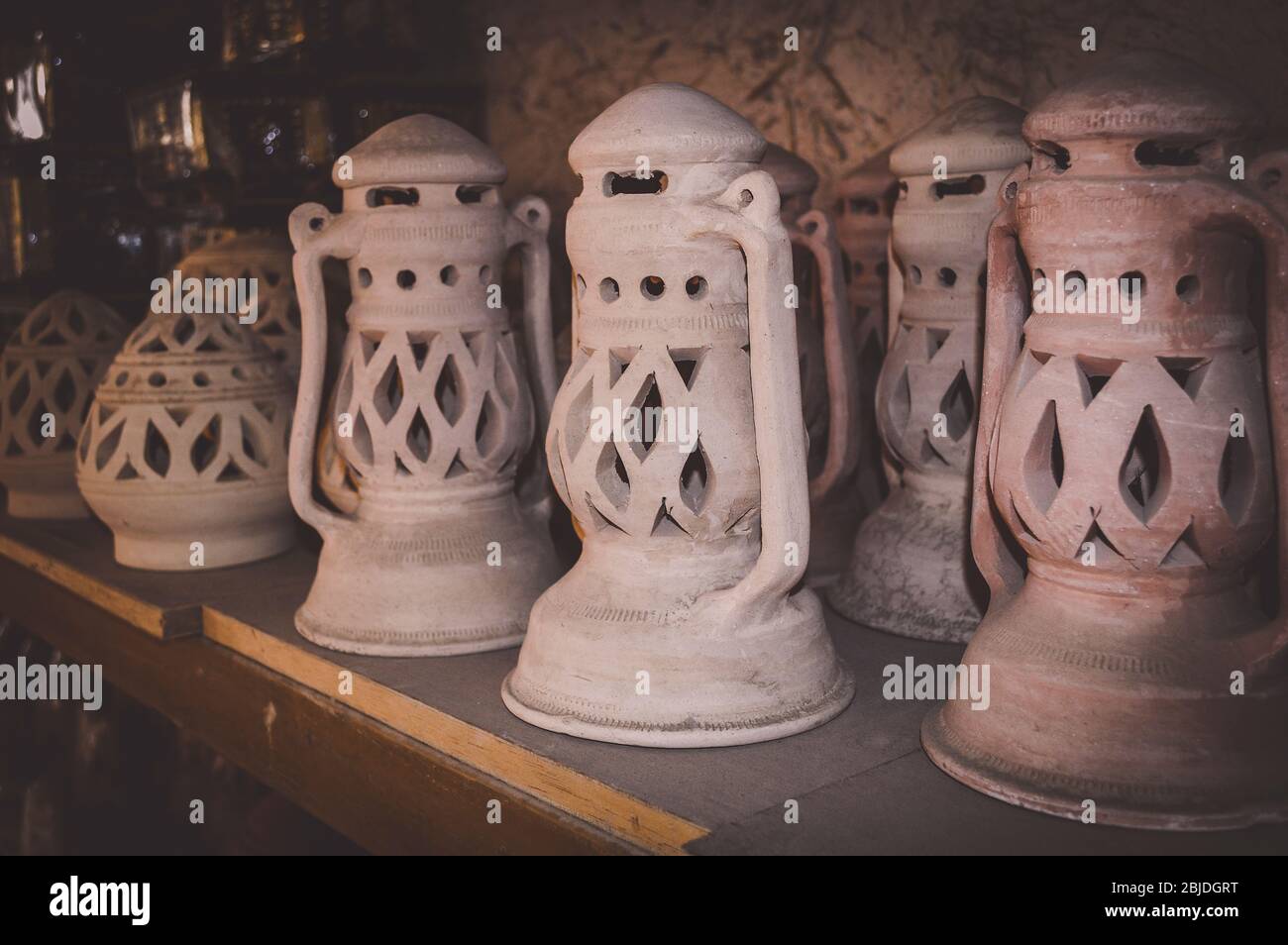 Crafts, pots and toys made of mud and soil Stock Photo - Alamy