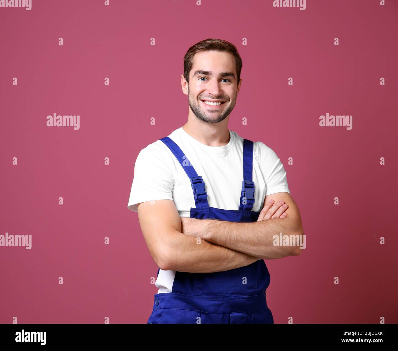 Young handsome construction worker works hi-res stock photography and ...