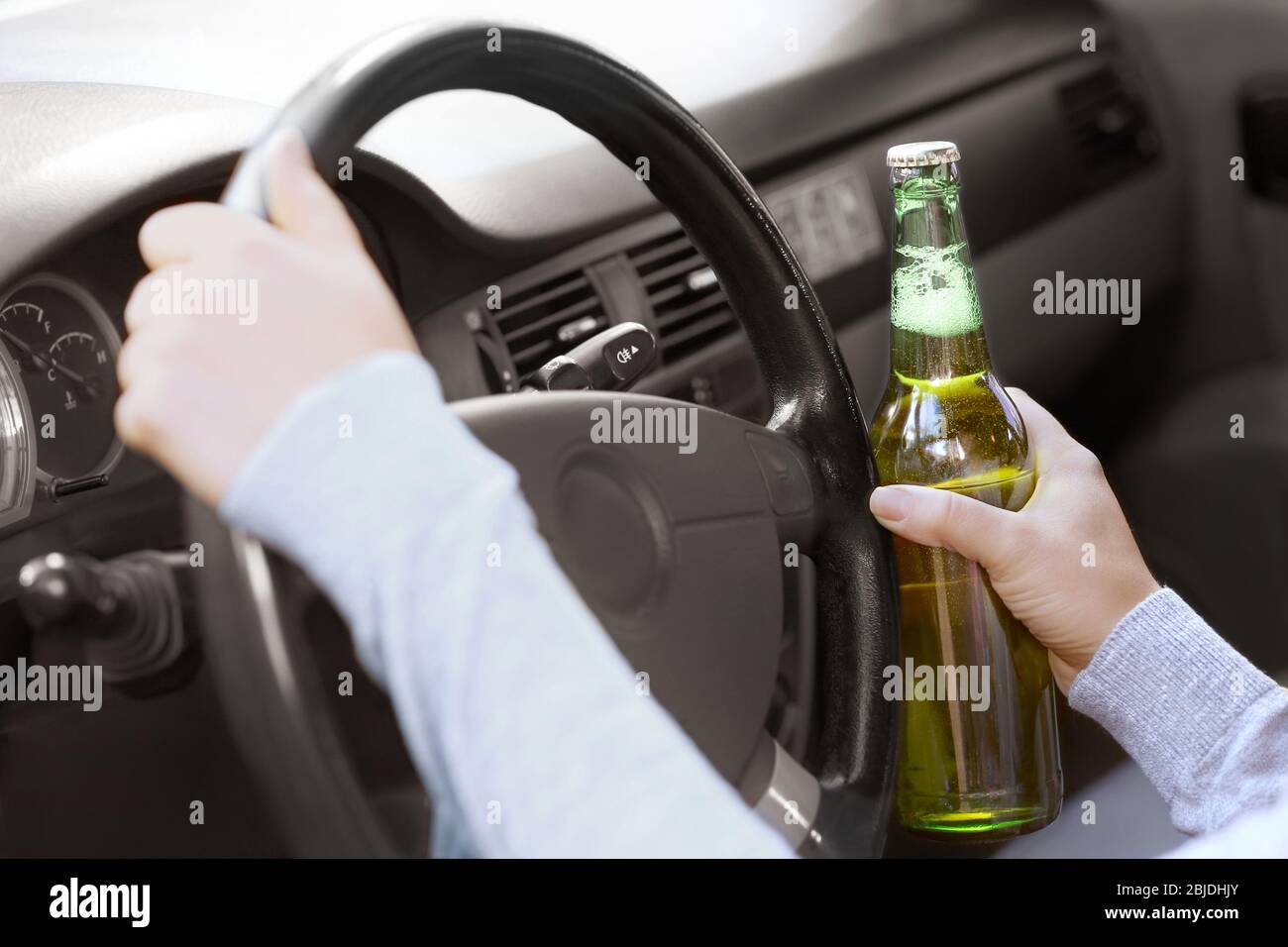 Drunk woman driving car beer hi-res stock photography and images - Alamy