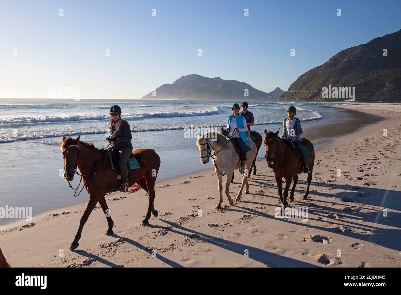 Horse riding on long beach, Cape Town, South Africa Stock Photo - Alamy