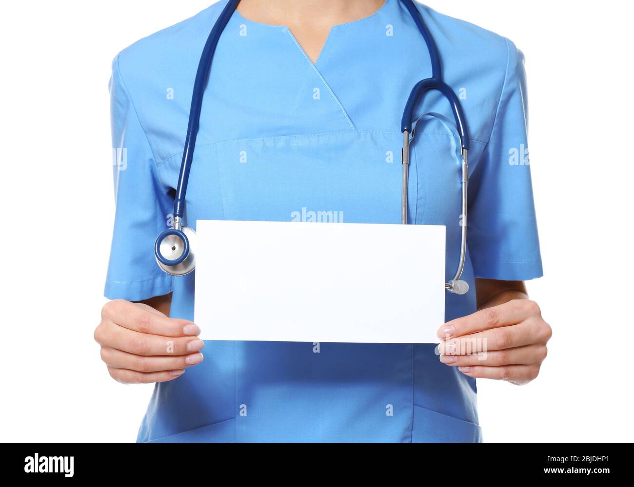 Close up view of doctor holding blank paper sheet on white background ...