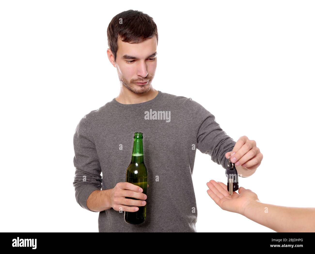 Drunk man giving car key to woman, on white background. Don't drink and ...
