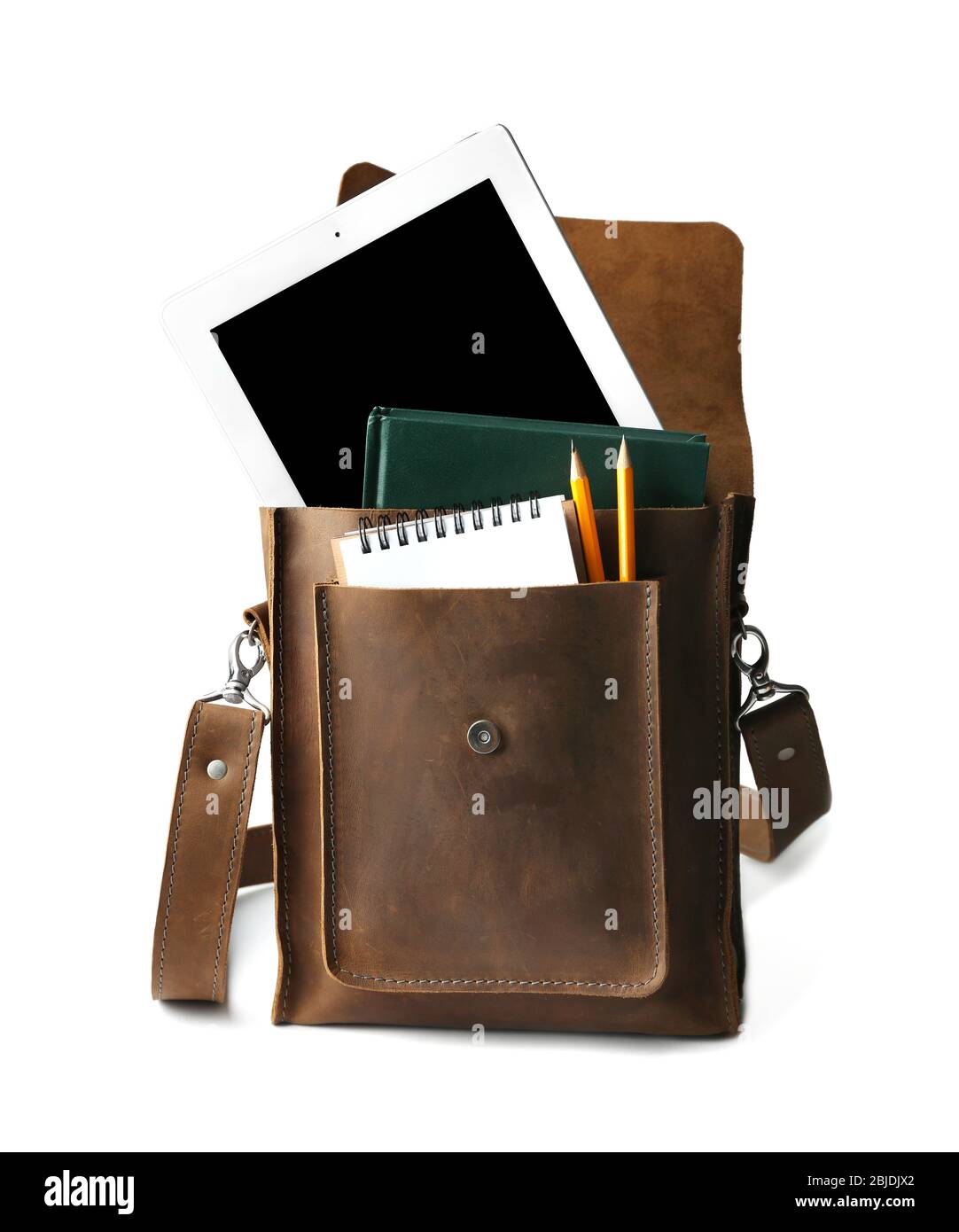 Brown leather bag with personal stuff on white background Stock Photo ...