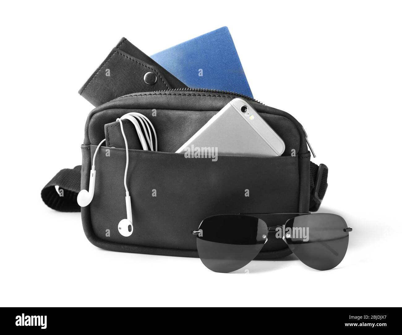 Black leather bag with personal stuff on white background Stock Photo ...