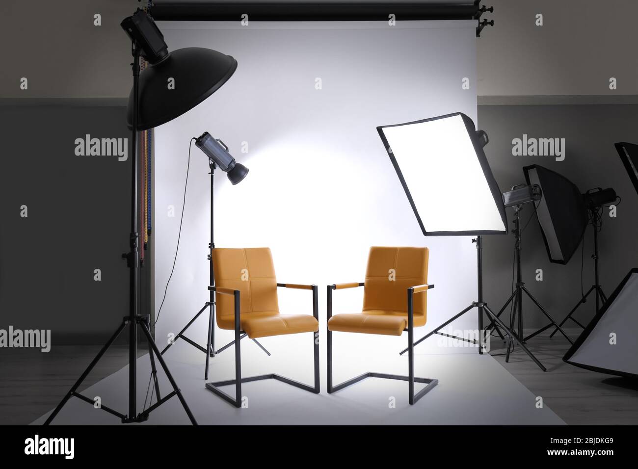 Professional photo studio with lighting equipment Stock Photo - Alamy