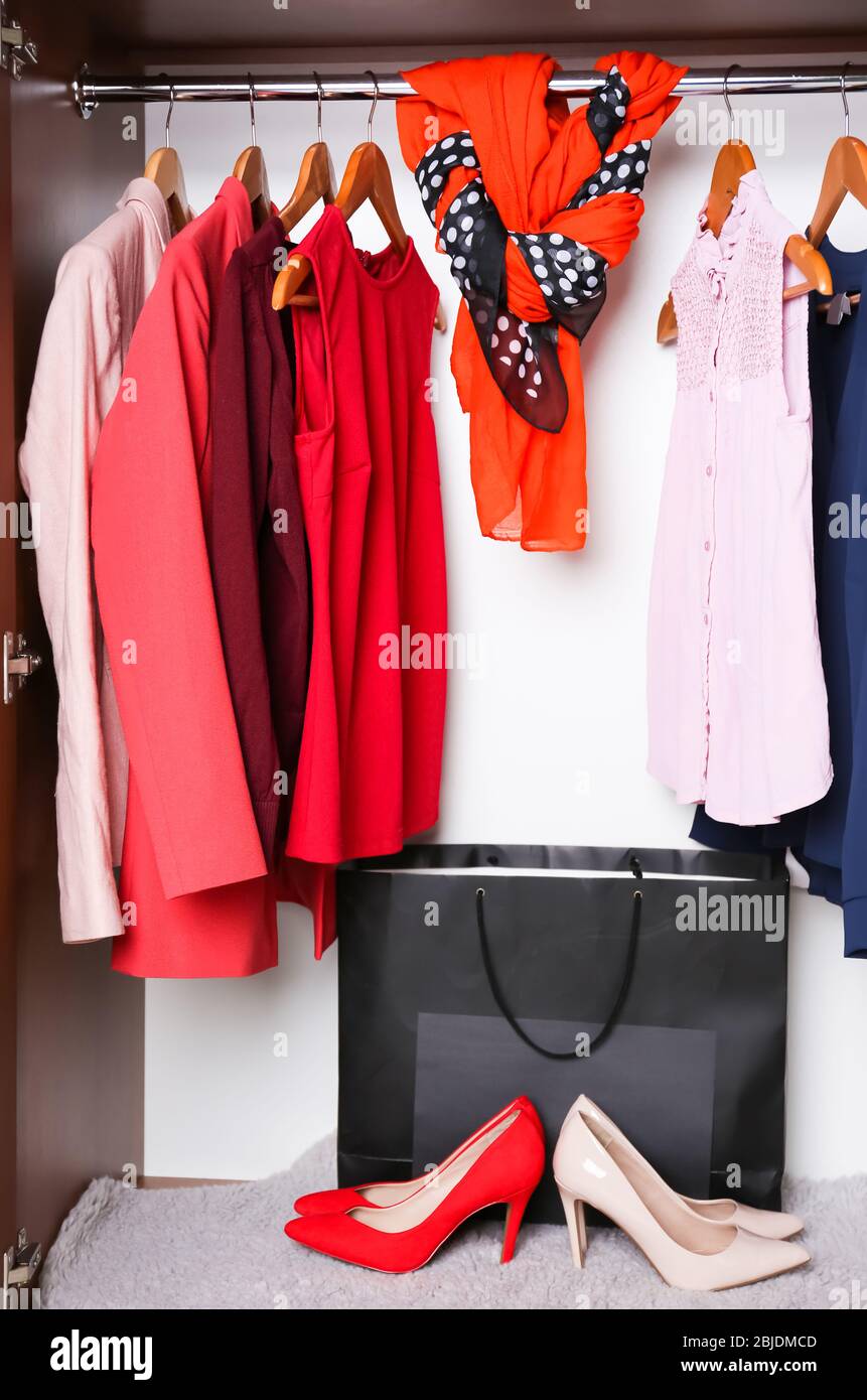 Elegant female clothes in wardrobe, closeup Stock Photo - Alamy