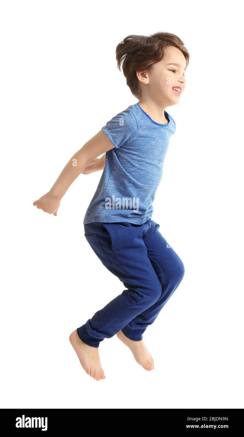 Cute emotional little boy jumping on white background Stock Photo - Alamy