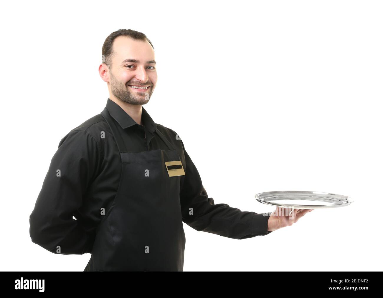 Handsome waiter with metal tray on white background Stock Photo - Alamy