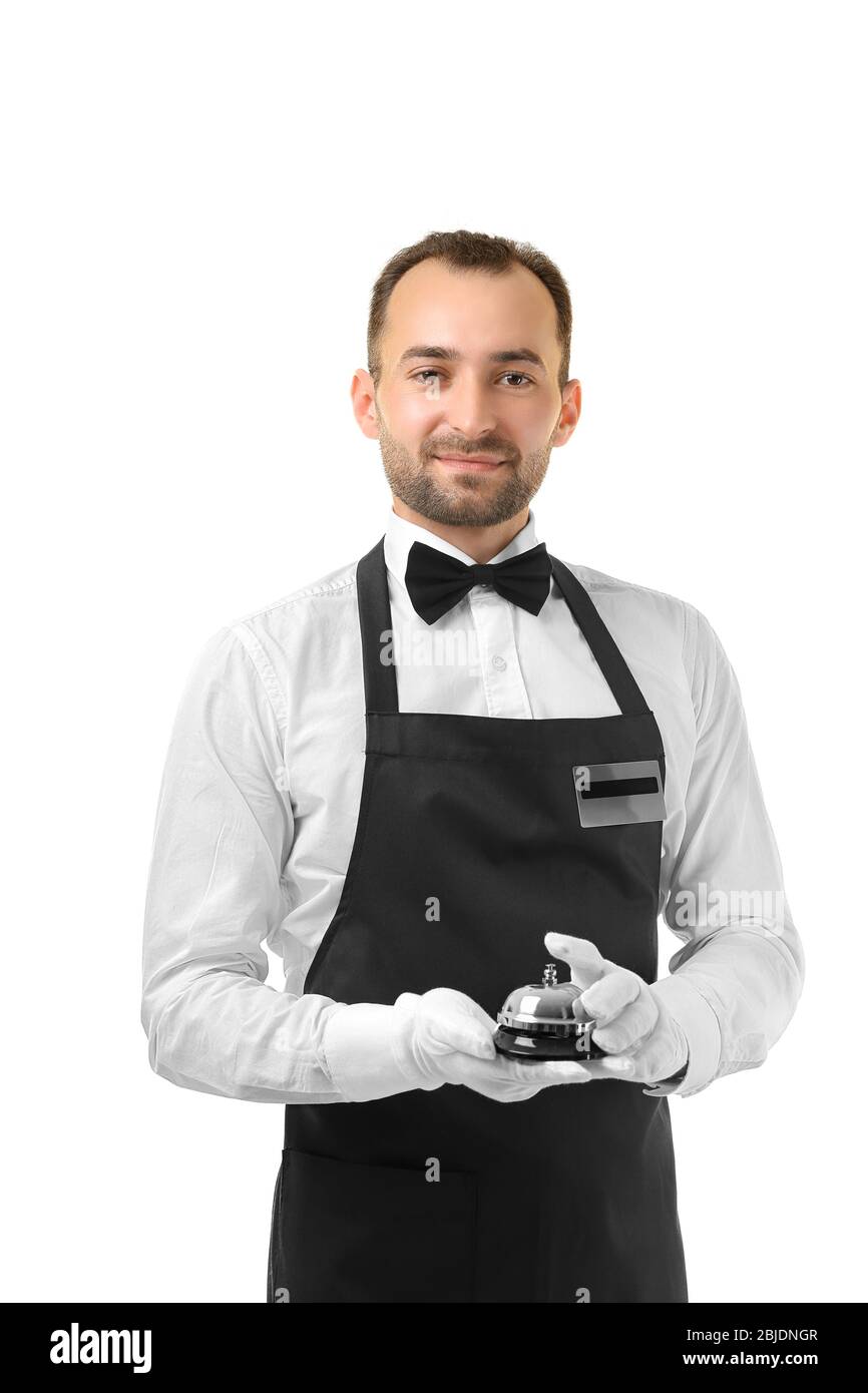 Handsome waiter with bell on white background Stock Photo - Alamy