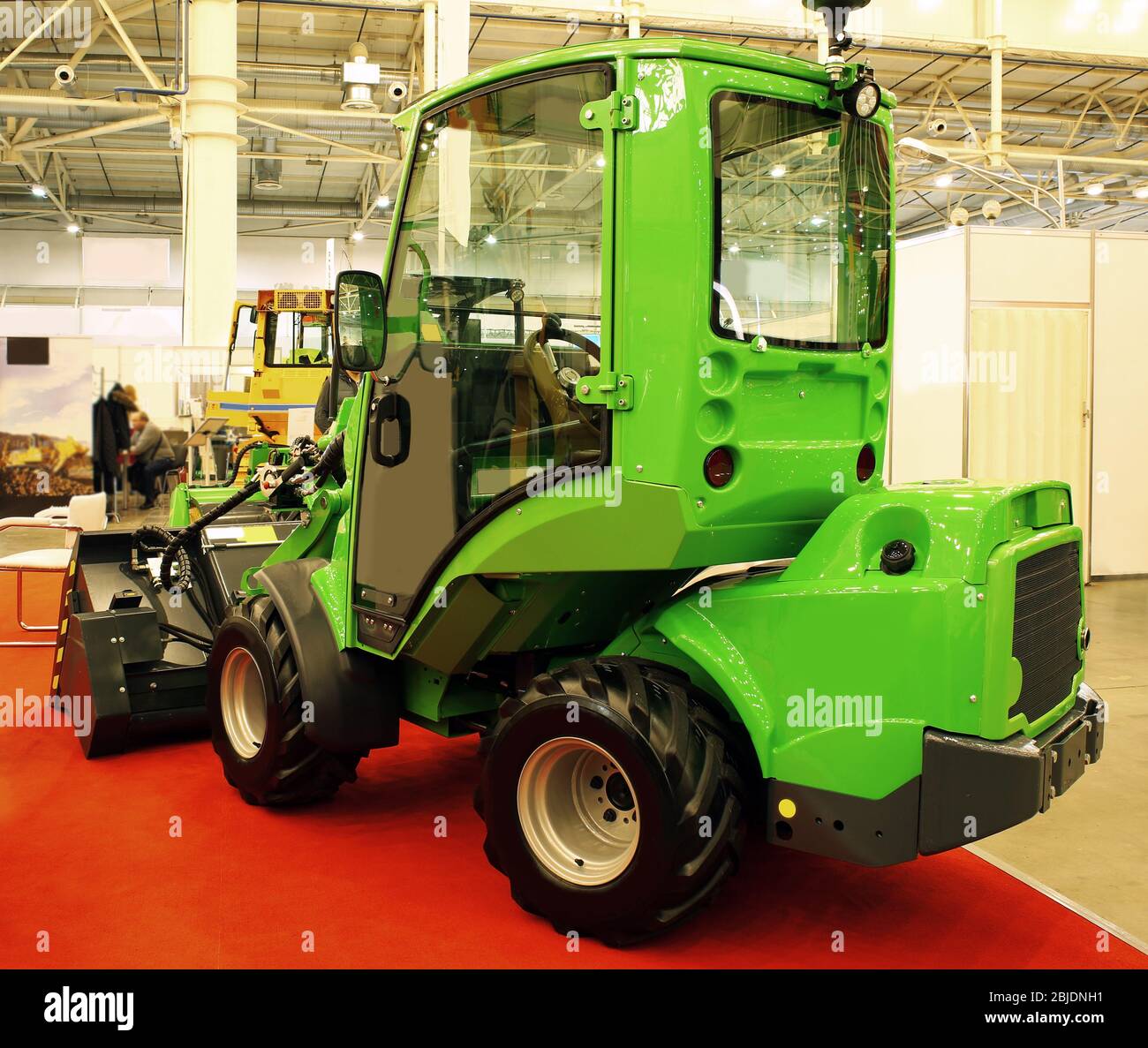 Mini bulldozer on exhibition Stock Photo - Alamy