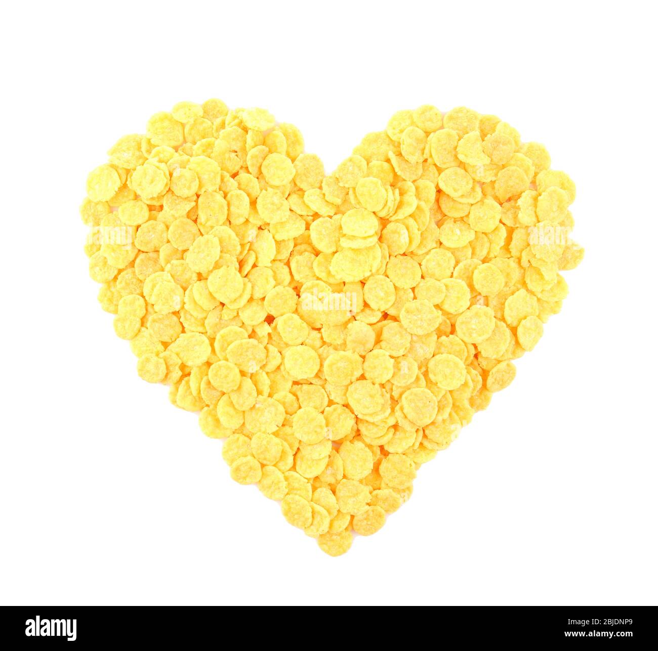Heart made of cornflakes on white background Stock Photo - Alamy