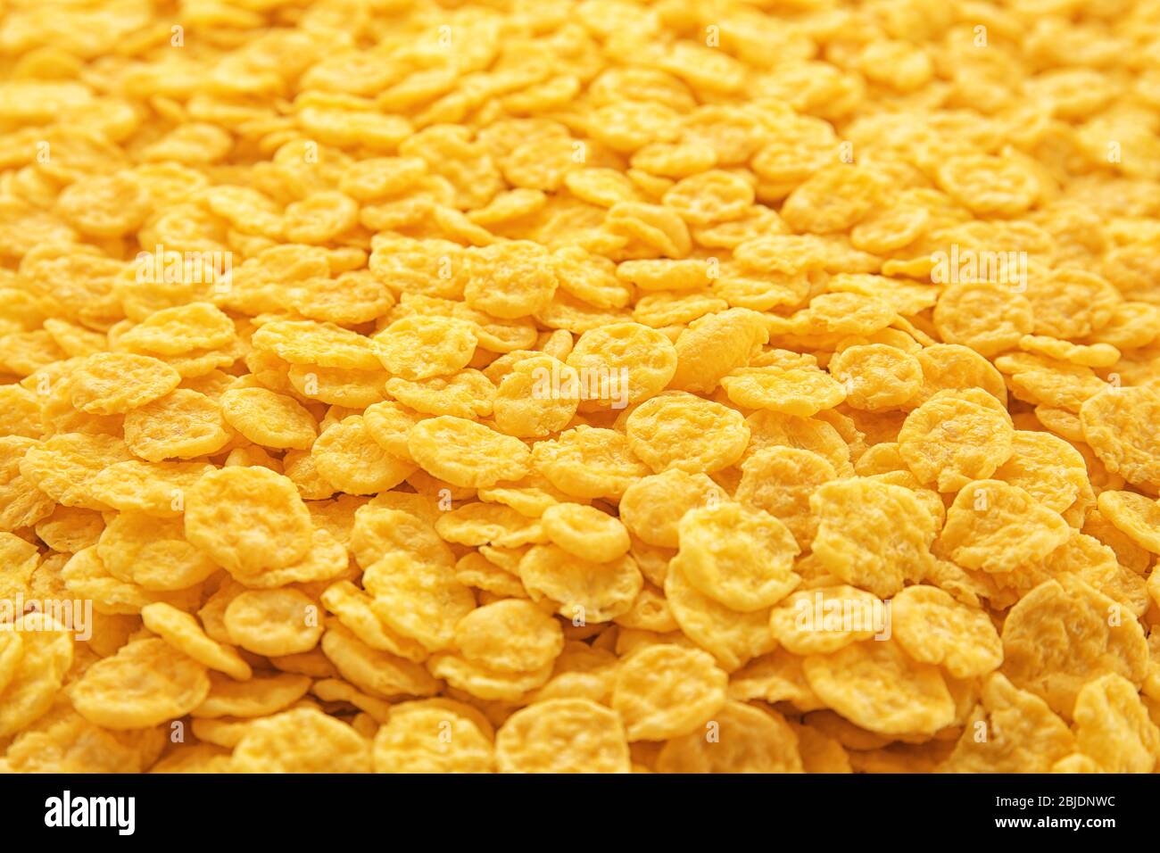 Crispy cornflakes background Stock Photo - Alamy
