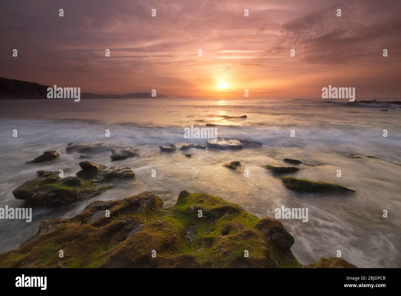 Getxo, Bizkaia/Basque Country; May 16, 2012. Colorful sunset at Azkorri ...