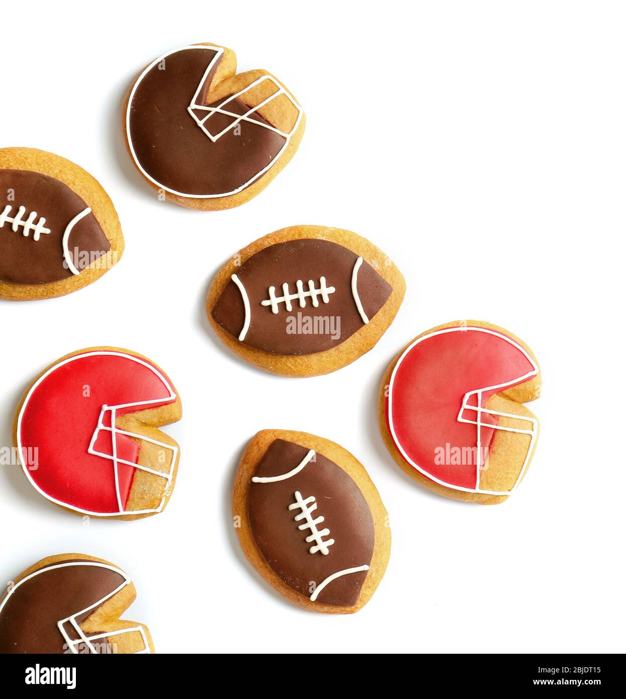 Delicious gingerbread cookies decorated with football signs on white ...