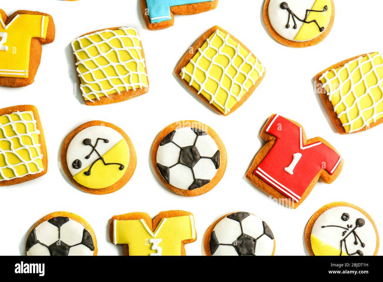 Delicious gingerbread cookies decorated with football signs on white ...