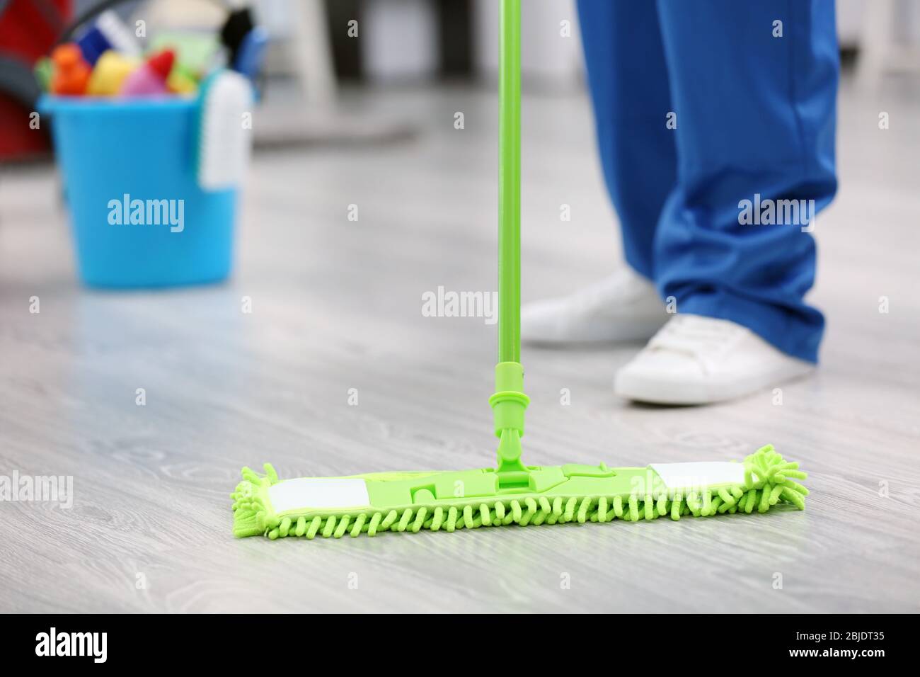 Closeup man legs cleaning floor hi-res stock photography and images - Alamy
